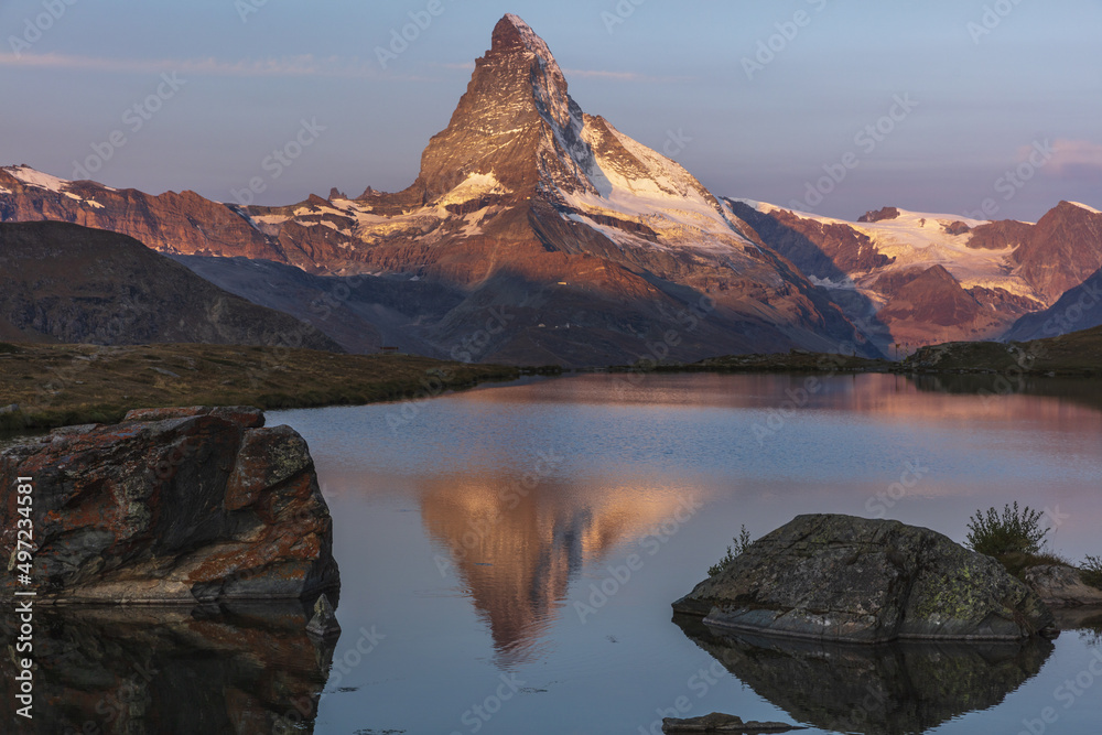 Mount Matterhorn sunset reflection in Lake Stellisee Stock Photo ...