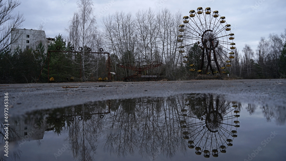 Pripyat abandoned ferris wheel in amusement park with radioactive ...