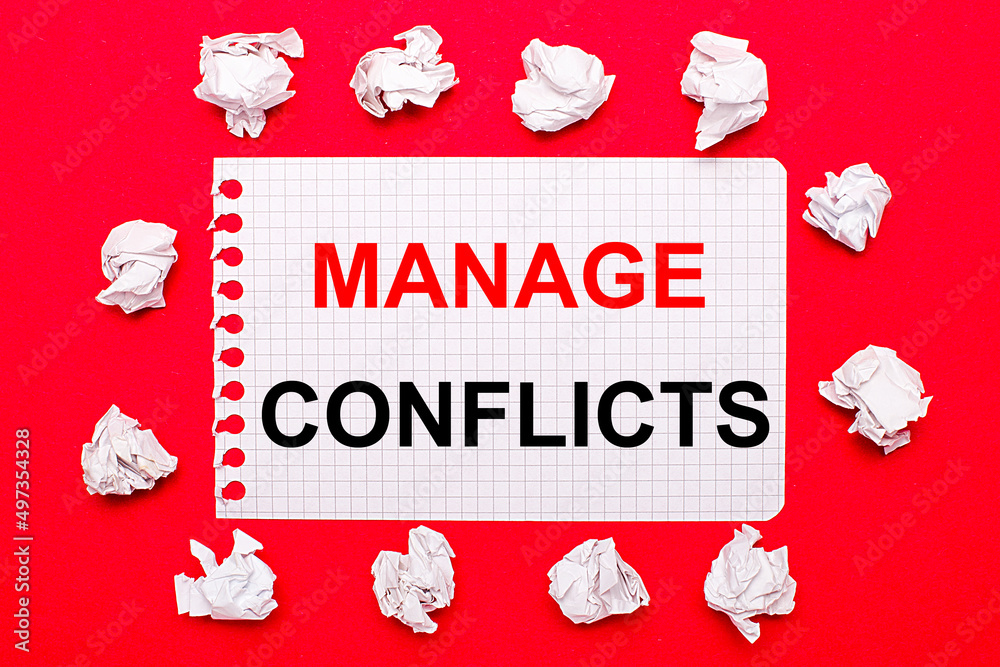 On a bright red background, white crumpled sheets of paper and a sheet ...