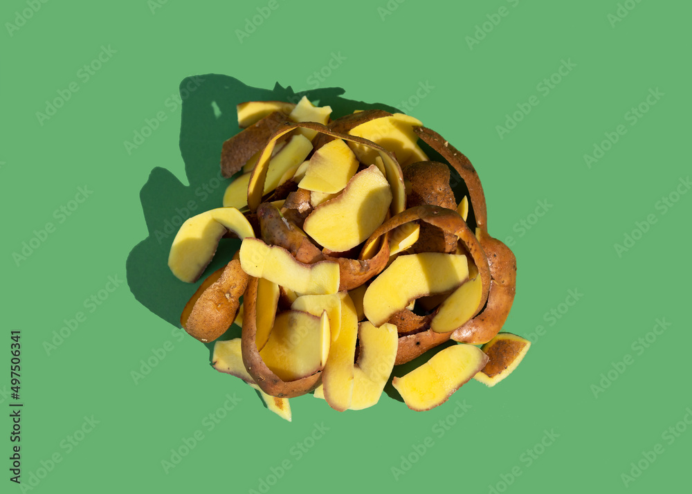 Concept of Stop food waste day. Potato peels are one of the most ...