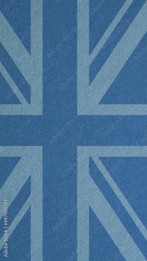British flag outline on blue cardboard surface. Paper texture with ...