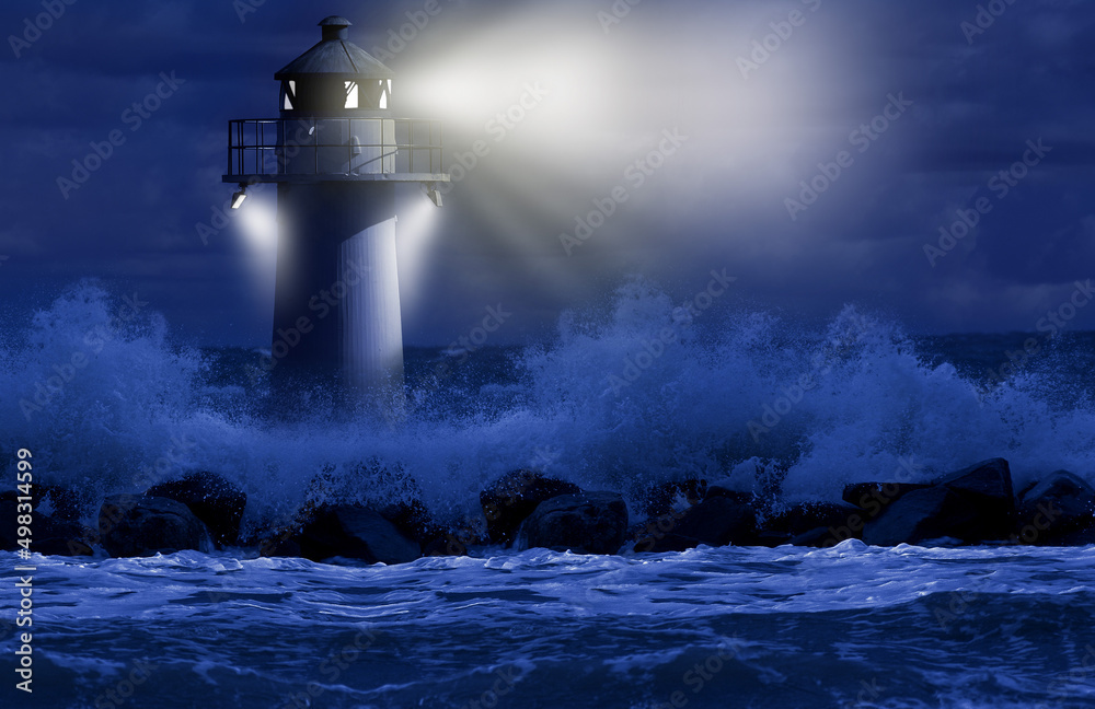 In the dark, the little lighthouse rises upright from the turbulent sea ...
