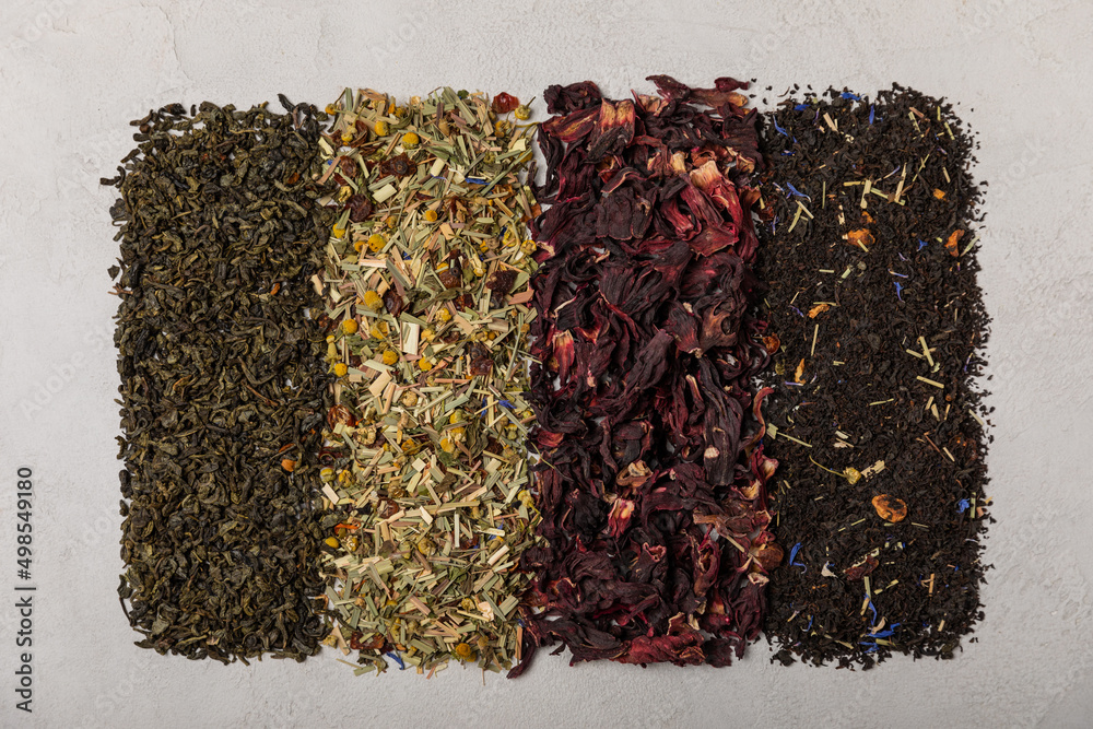 Various types of tea on a light texture background. Tea mixture. Range ...