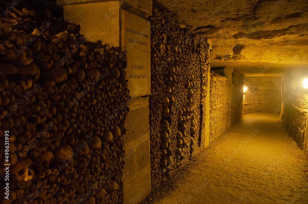 The Catacombs of Paris underground ossuaries, which hold the remains of ...