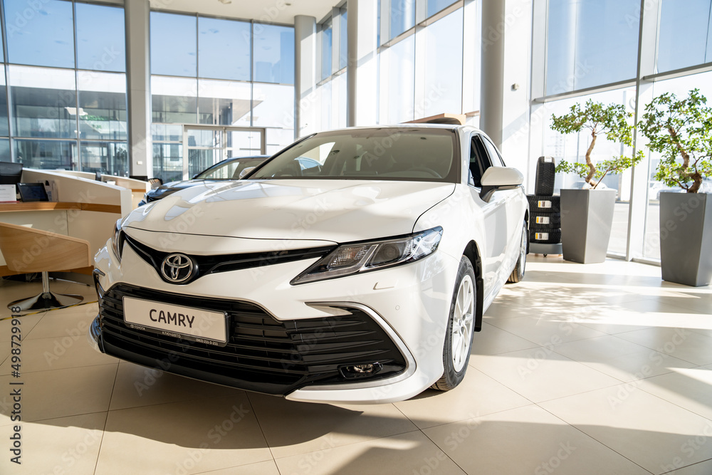 new white car Toyota camry in premises of the dealership of Toyota cars ...