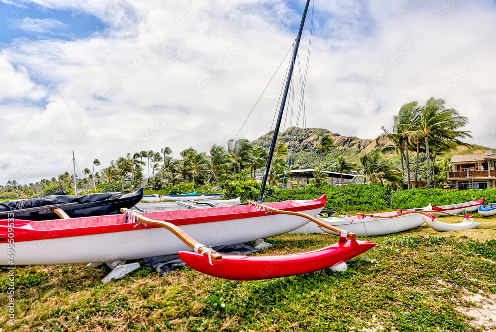 Outrigger canoes along Lanikai Beach on Oahu Stock Photo | Adobe Stock