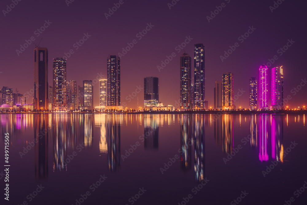 City skyline at night, tallest towers in the Emirates and its ...