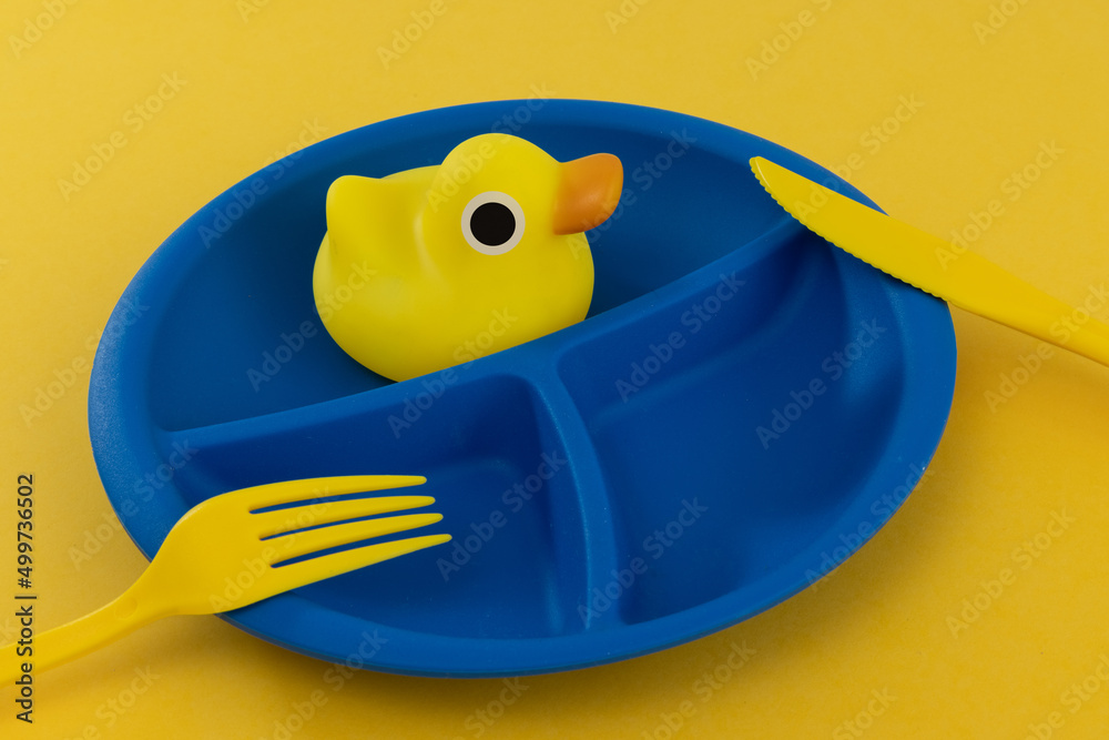 Pato de hule en plato Stock Photo | Adobe Stock