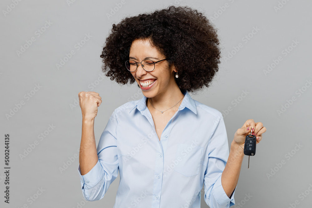 Young overjoyed employee business corporate lawyer woman of African American ethnicity in ...