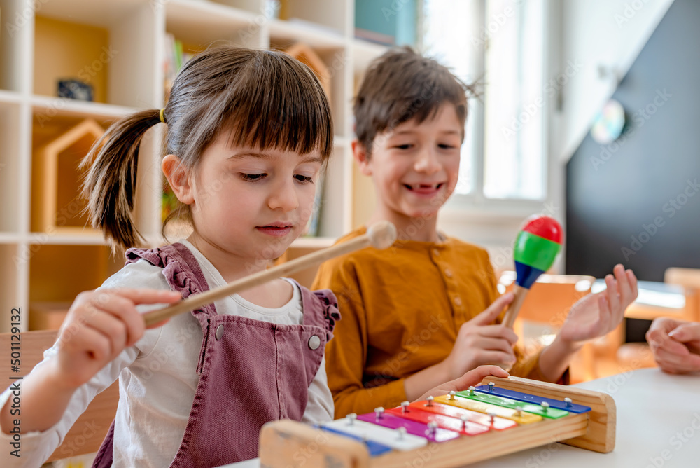 Kindergarten Children Learning Music Using Various Colorful Instruments ...
