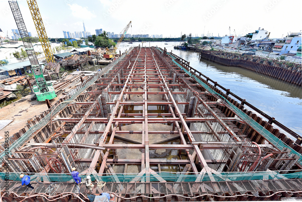 Large construction in the river for urban flood prevention. Industry ...