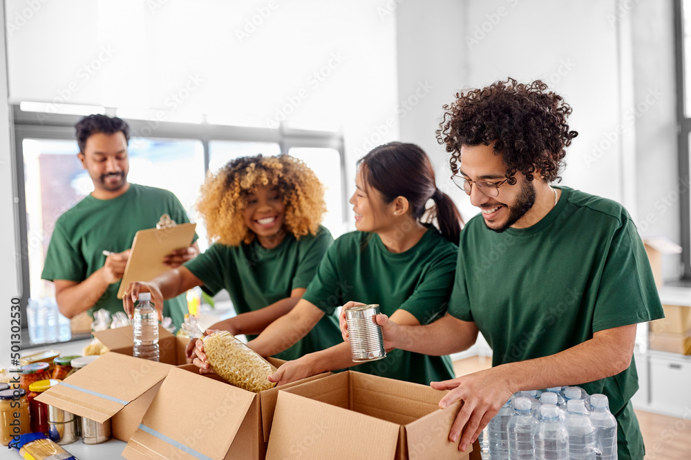 charity, donation and volunteering concept - international group of ...