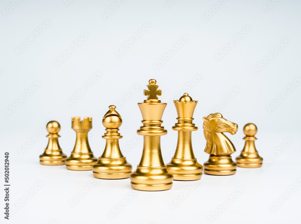 Set of luxury golden chess pieces isolated on white background. The ...