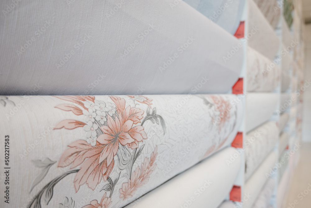 Samples of different wallpapers on store window racks Stock Photo ...