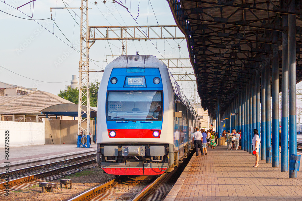 Double-decker passenger electric train Intercity arrives at the ...