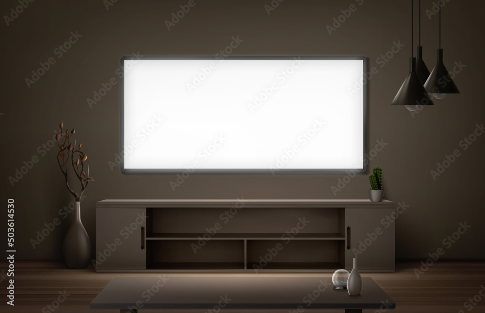 Wide lcd tv screen hanging on wall in living room at night. Modern ...