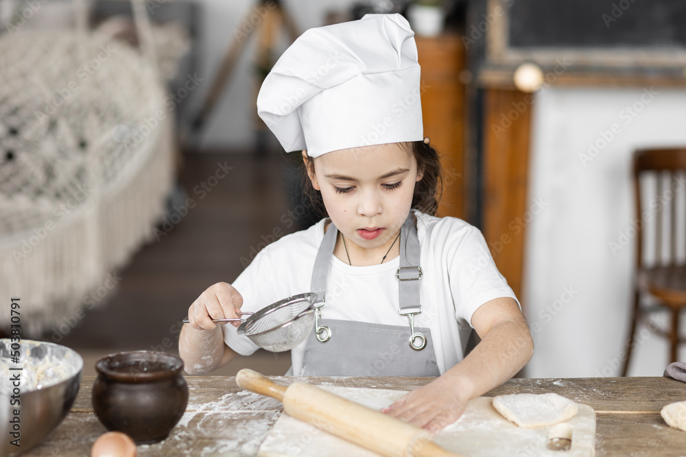 Cute little girl baking homemade sweet pie together, having fun. Home ...