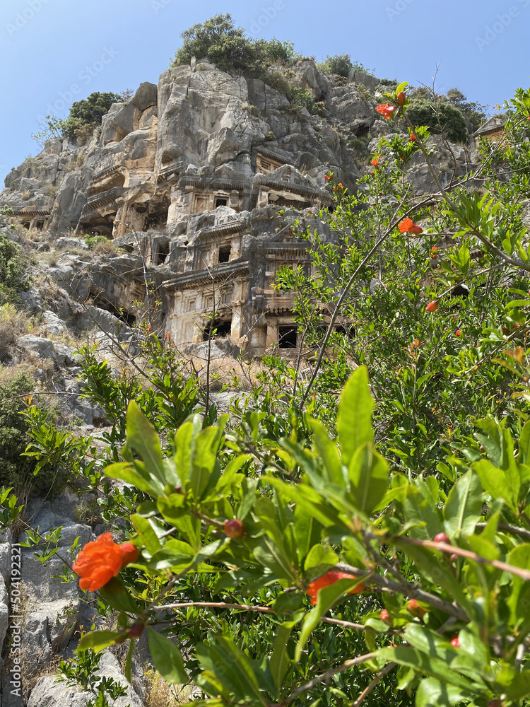 Historical Stone faces bas relief and ancient theater at Myra ancient ...