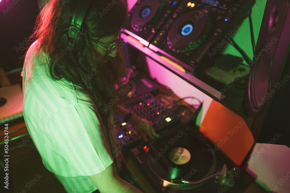 DJ Scratching vinyl record on turntable Stock Photo | Adobe Stock
