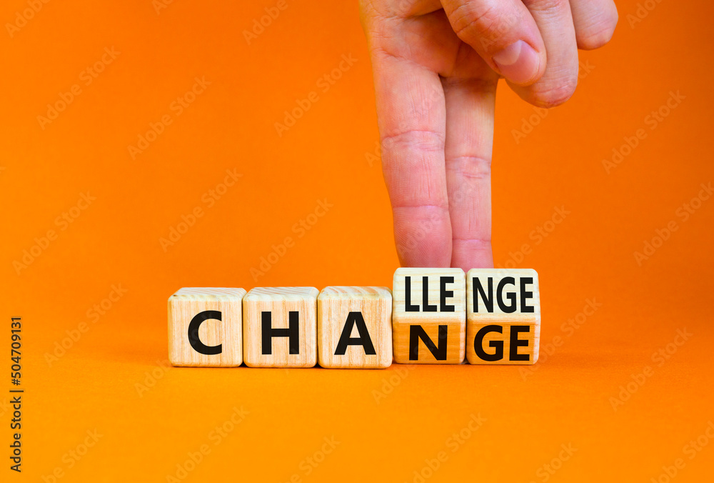 Stock-Foto „Chance or challenge symbol. Businessman turns wooden cubes ...
