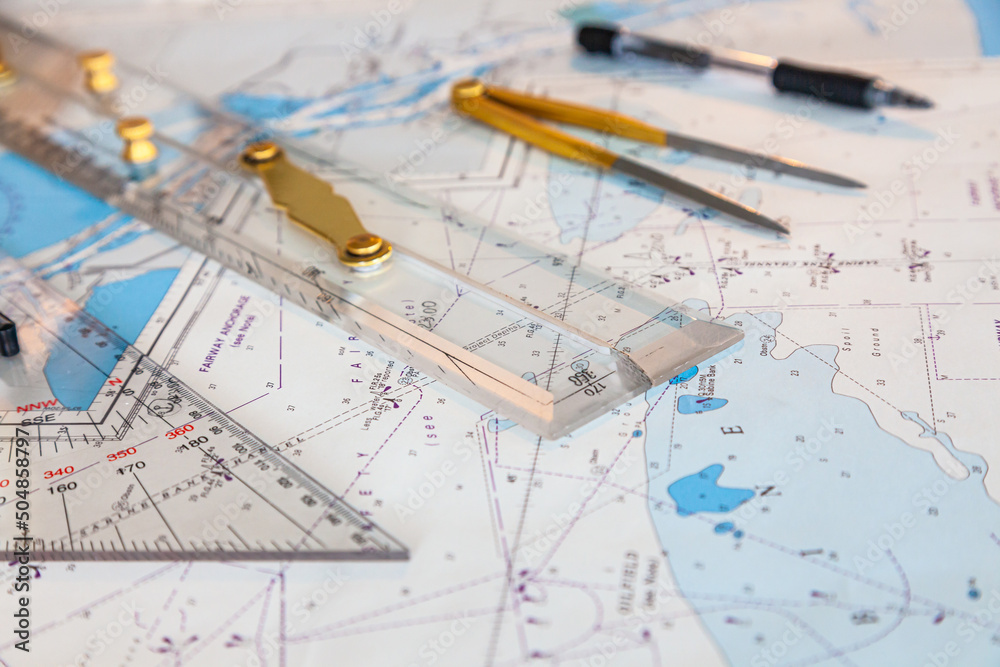 Stock-Foto „Navigation ship chart for building a sailing route. Plotter ...