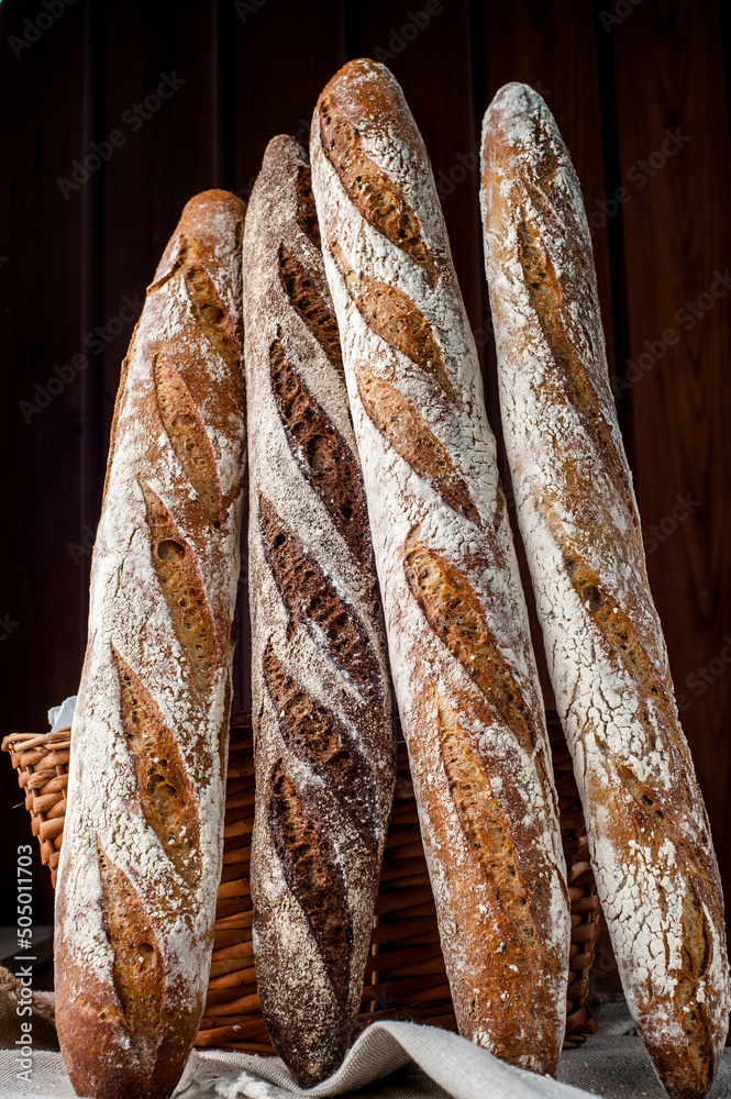 Baguette and bread. Craft bakery. Homemade pastries. Fresh bread in the ...