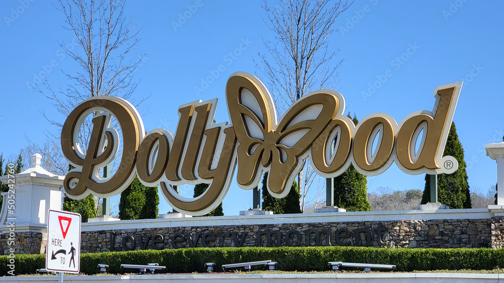 PIGEON FORGE, TN, USA - MARCH 27, 2022: The entrance to Dollywood with ...