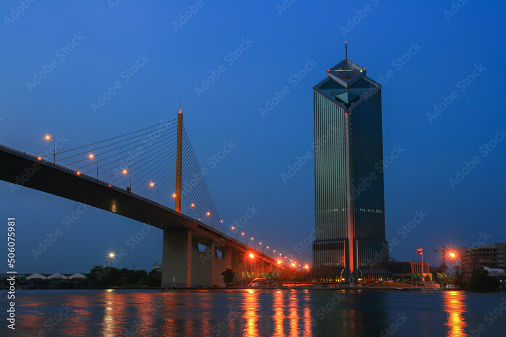 Rama 9 cable-stayed bridge with Kasikorn Bank Building at night time, is a one most popular ...