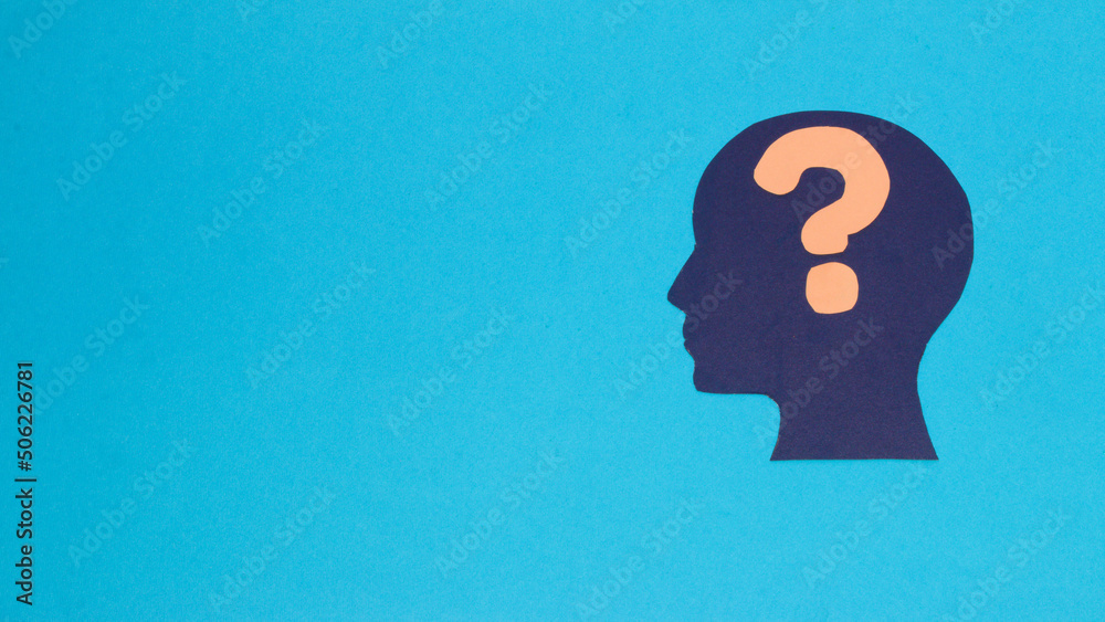 blue paper head with question mark in place of brain on blue background ...