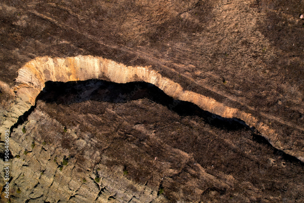 Photo Stock Crack in dry ground. Dry lake in process of drought and lack of rain. Cracked soil ...