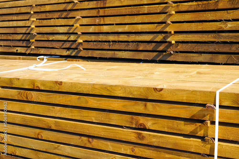 Stacked impregnated thick pine wood boards for background and texture ...