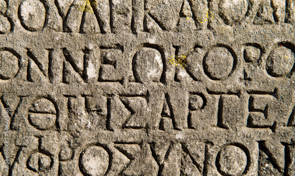 Ancient greek background with greek letters carved in stone. Stock ...