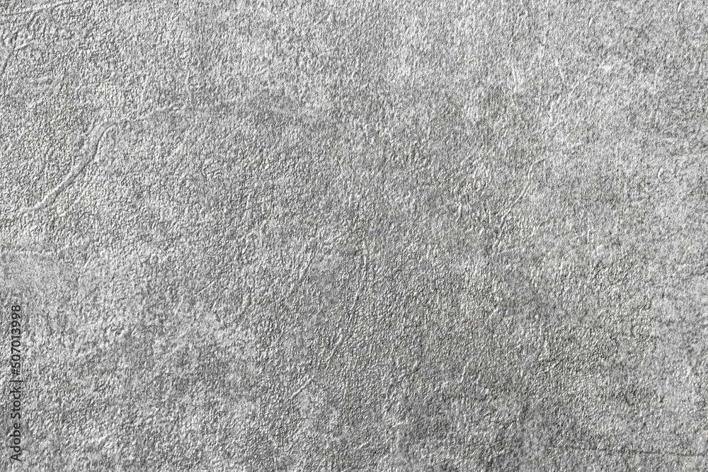 Gray background of decorative plaster with abstract spots. Unusual ...