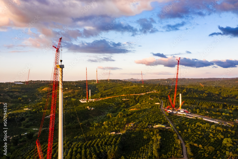 Installing of wind turbine tower with construction crane, Power plant ...