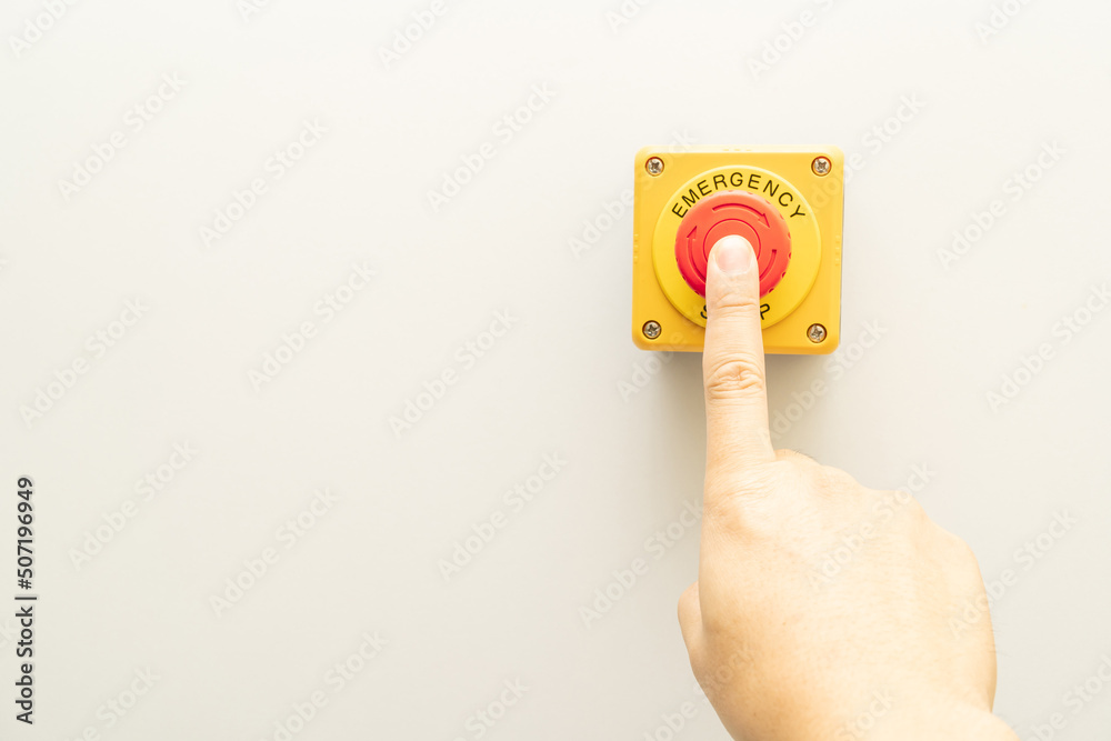 Stop Button and the Hand of Worker About to Press it. emergency stop ...