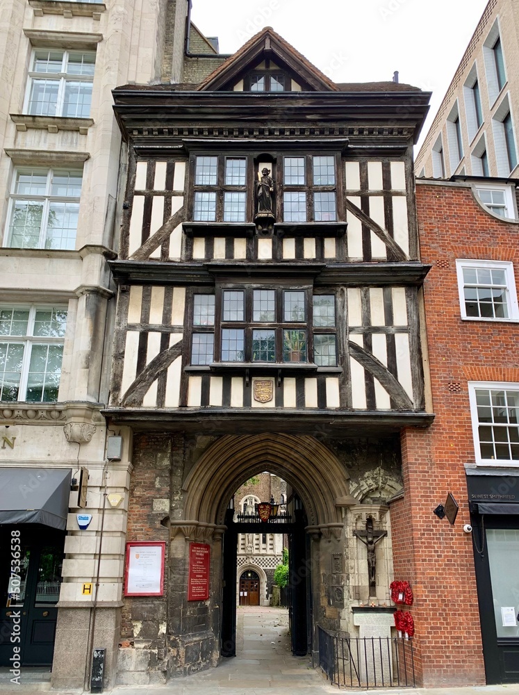 St. Bartholomew’s Gatehouse in City of London. Street view of City of ...
