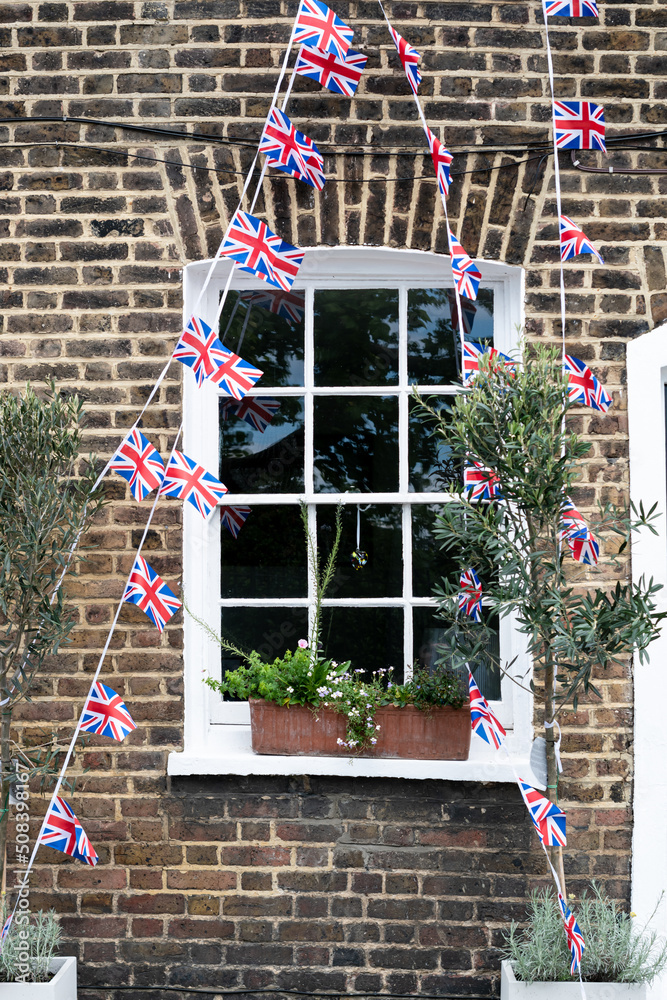 Union Jack flags on the street during queens jubilee celebration ...