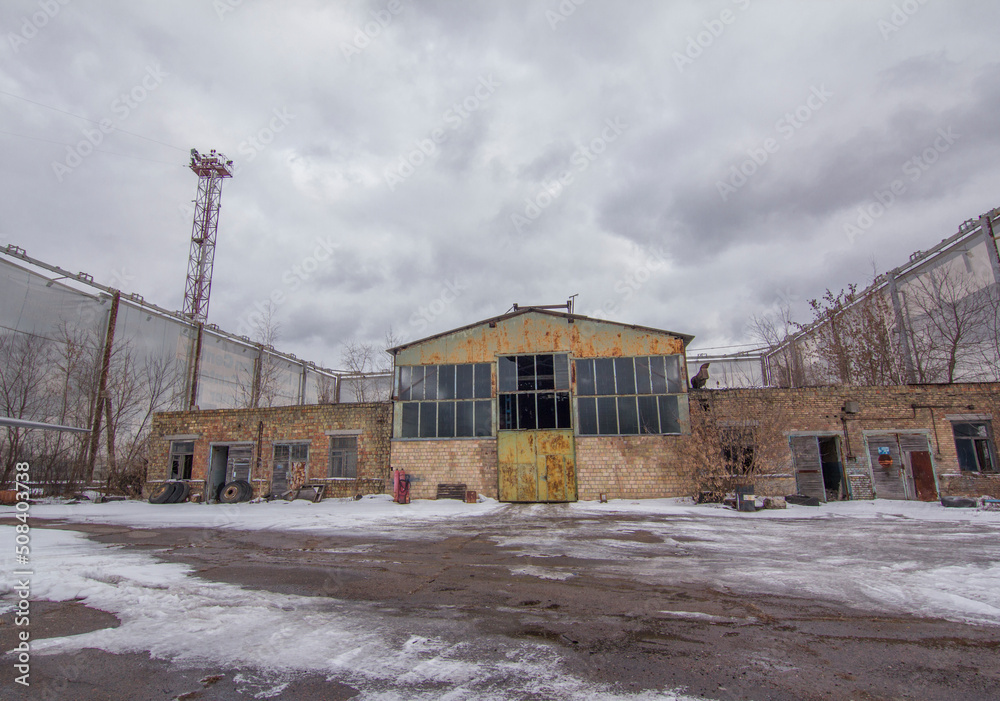 An old Soviet aircraft hangar at a modern airport. World War II ...