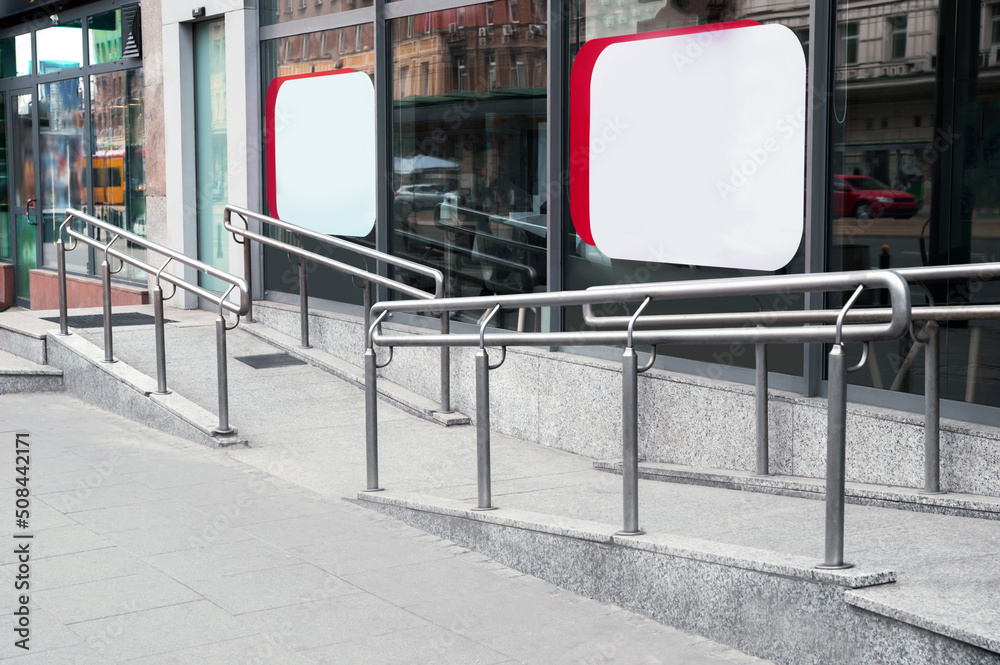 Tiled ramps with shiny metal railings outdoors Stock Photo | Adobe Stock