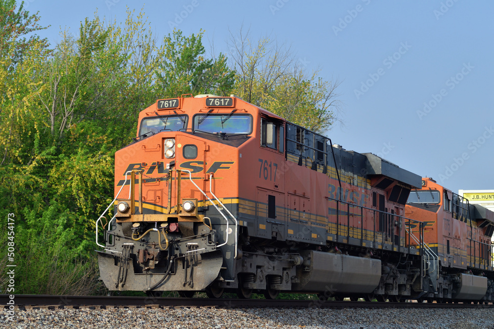Burlington Northern Santa Fe Railway locomotives lead a freight train ...