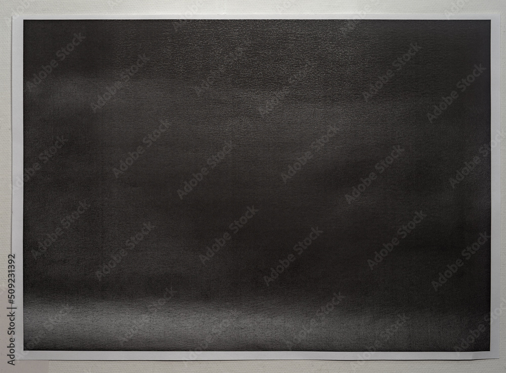 black printer ink remain on white paper behind clear film, black and ...