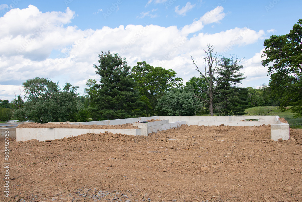 Foto Cement foundation of house in construction site on land the ...