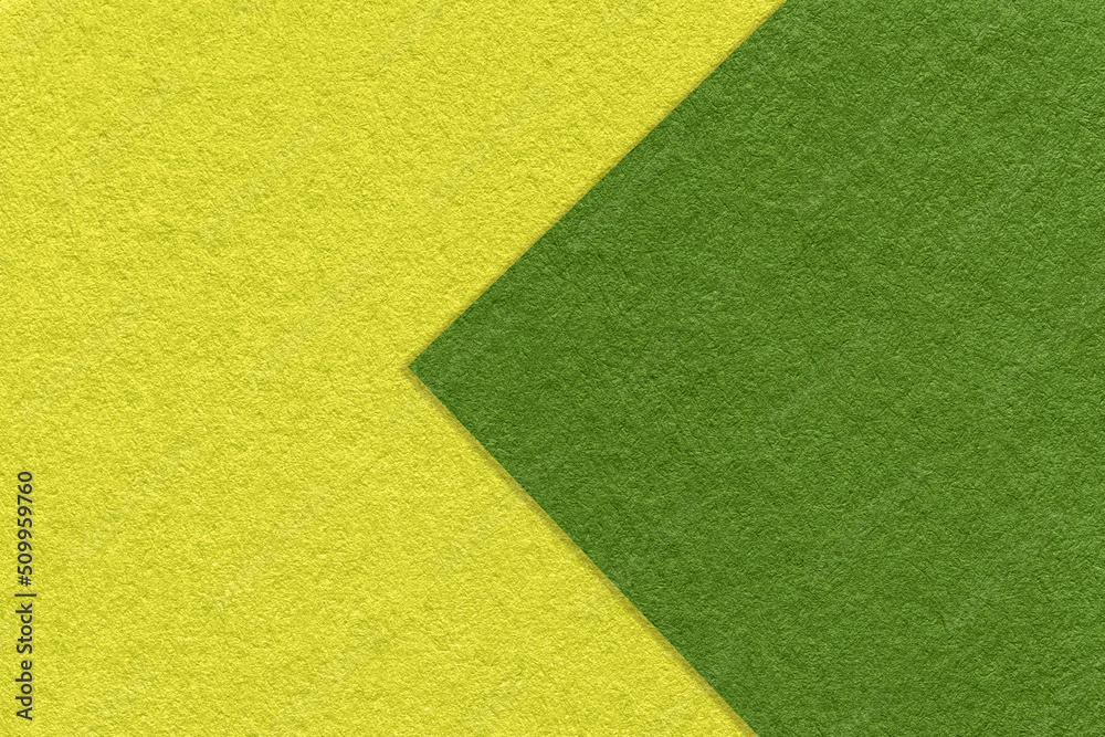 Texture of green and yellow paper background, half two colors with ...