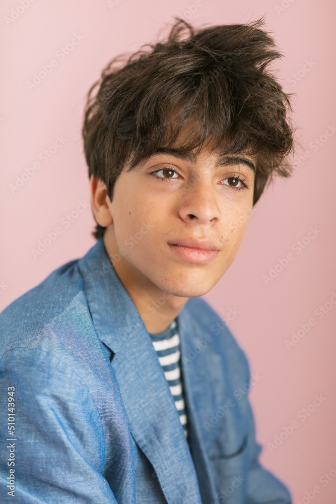 Confident teen model boy studio portrait Stock Photo | Adobe Stock