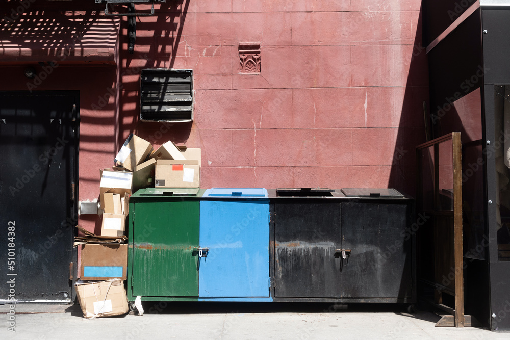 Trash and recycling cans in the city Stock Photo | Adobe Stock