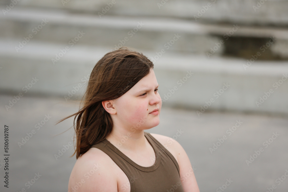 Obese fat kid girl training and exercise at park town on morning ...