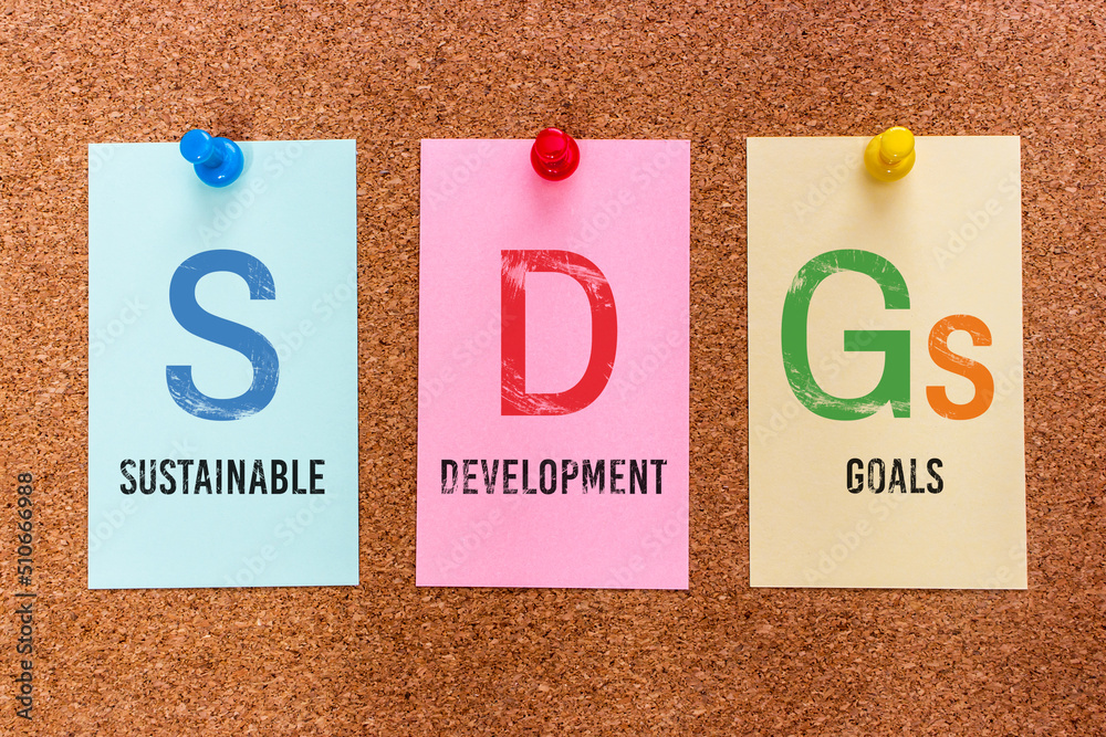 Conceptual 3 letters keyword SDGs (Sustainable Development Goals), on ...