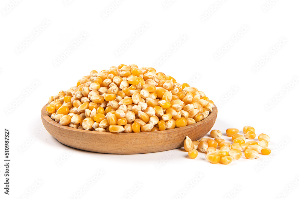 dry corn in plate isolated on white background.Unpopped popcorn Stock ...