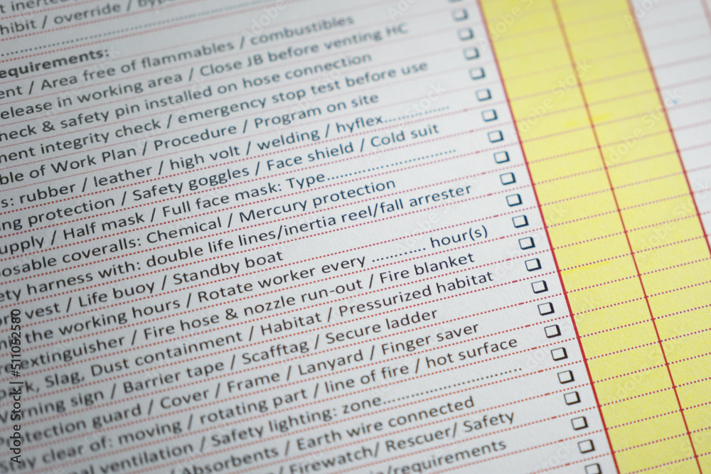 Safety checklist items with tick box on the work permit document paper ...