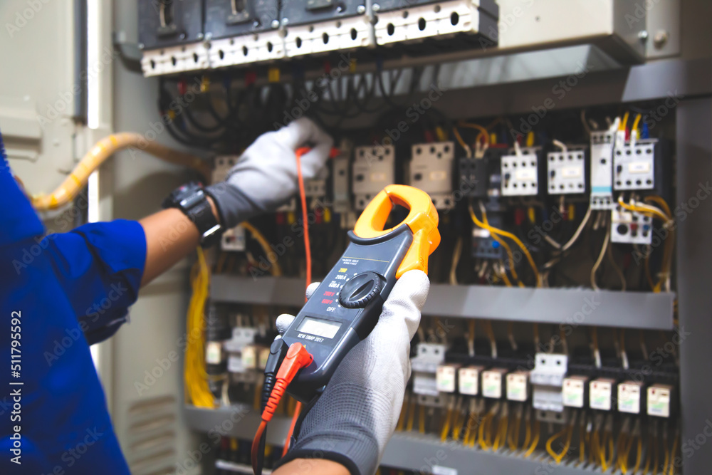 Electricity and electrical maintenance service, Engineer hand holding ...